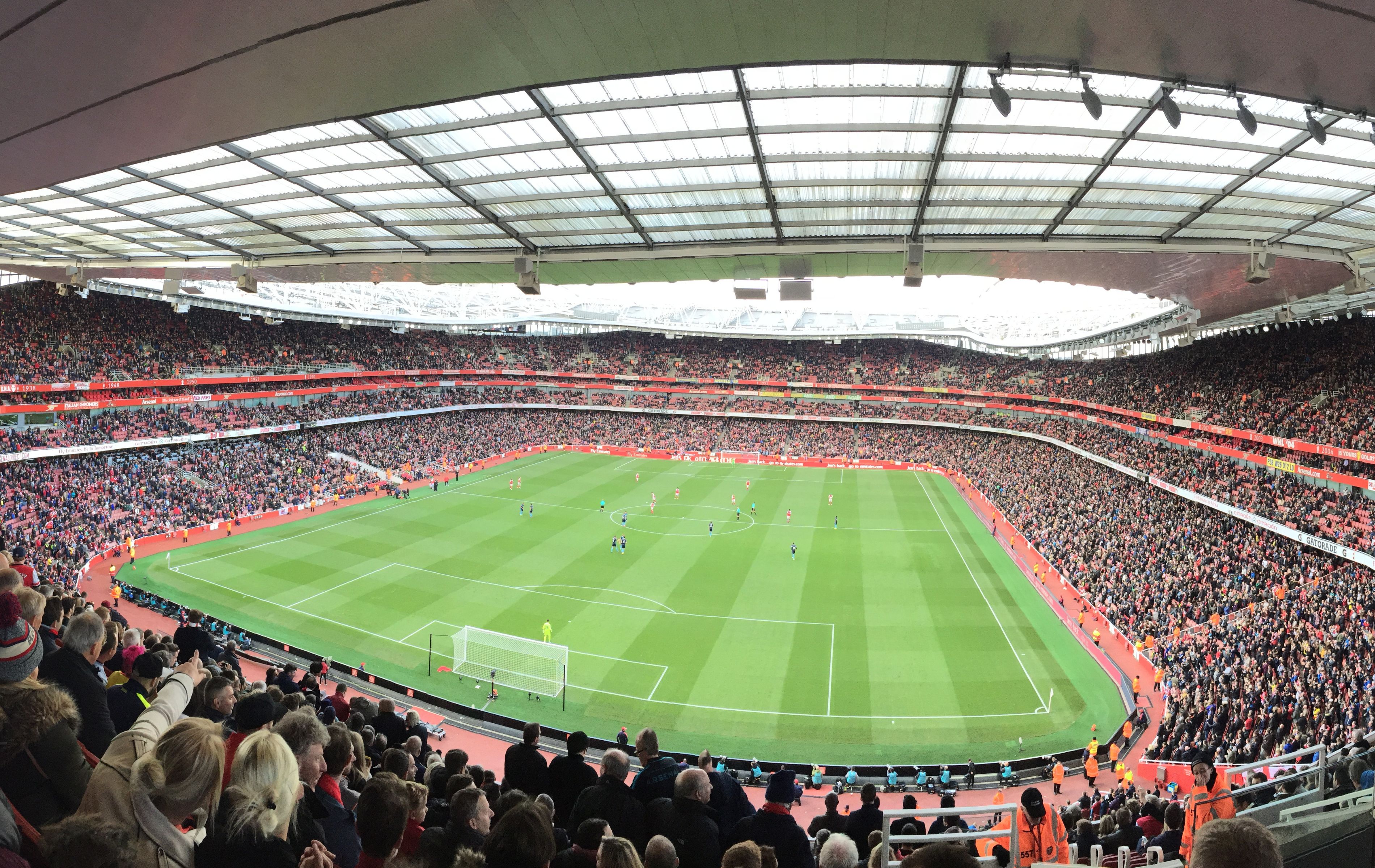 A home game at Arsenal, Chelsea or Manchester United.