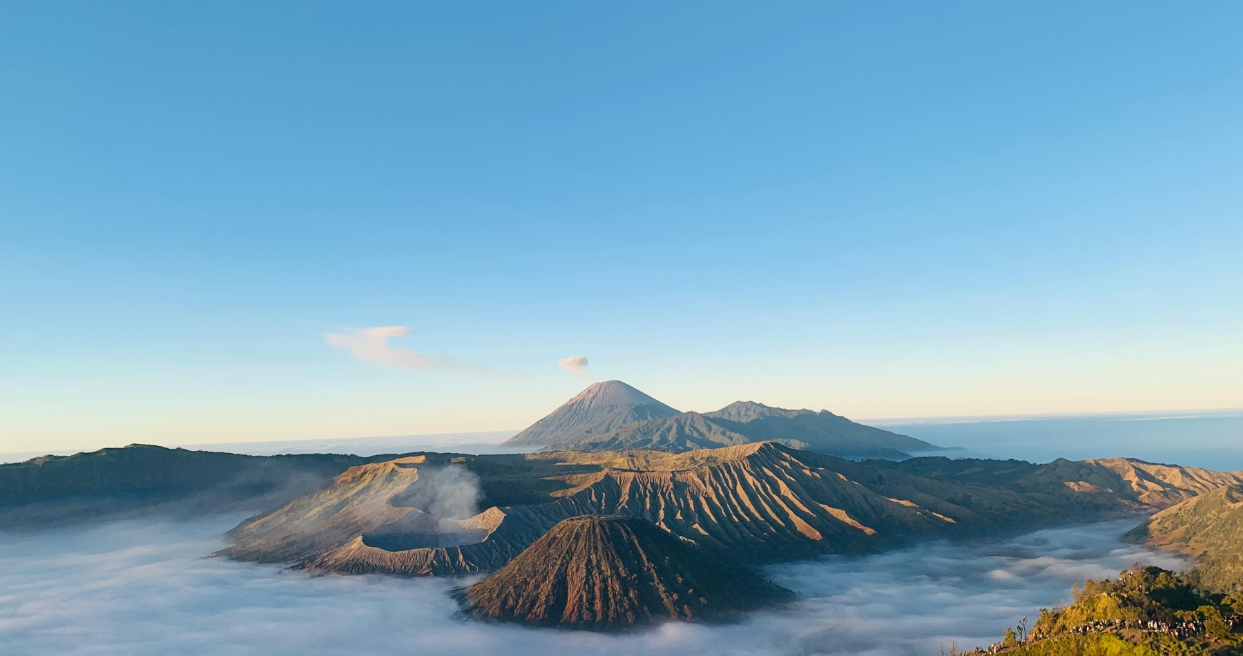 Views over a primordial landscape of steaming volcanoes from the top of ...